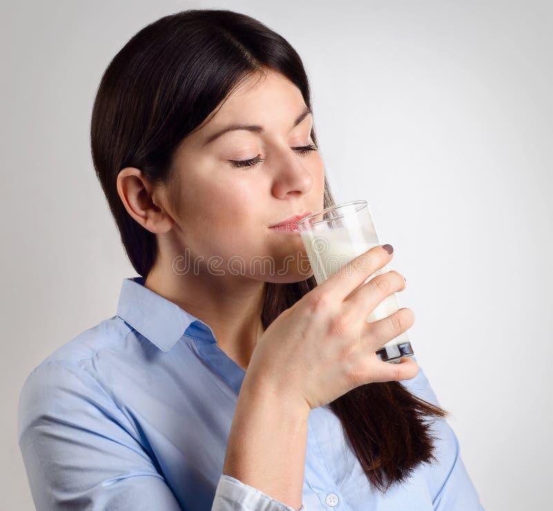Young woman drinking milk stock image. Image of energy - 54098073