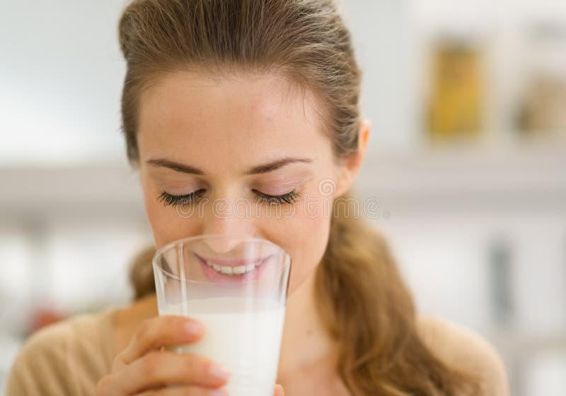 Young Woman Drinking Milk in Kitchen Stock Image - Image of healthy ...