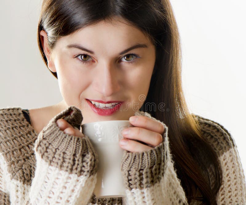 Young woman drinking tea stock photo. Image of student - 38151478