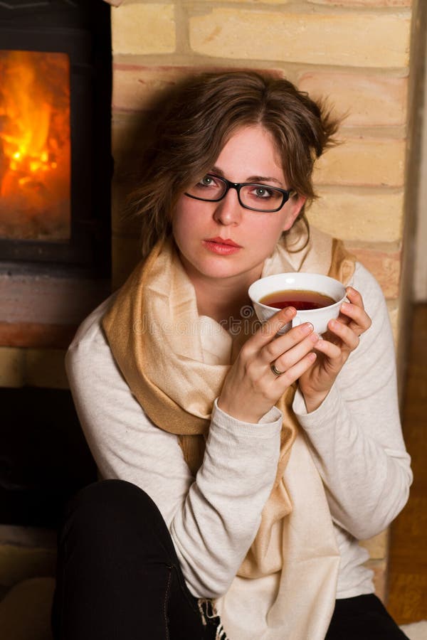 Young woman drinking tea stock image. Image of portrait - 82530029