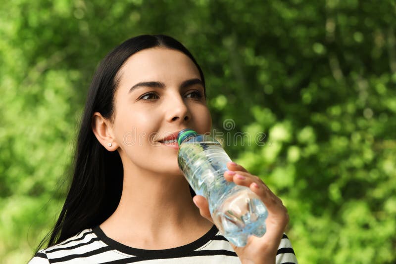 Young Woman Drinking Water Outdoors. Refreshing Drink Stock Photo ...