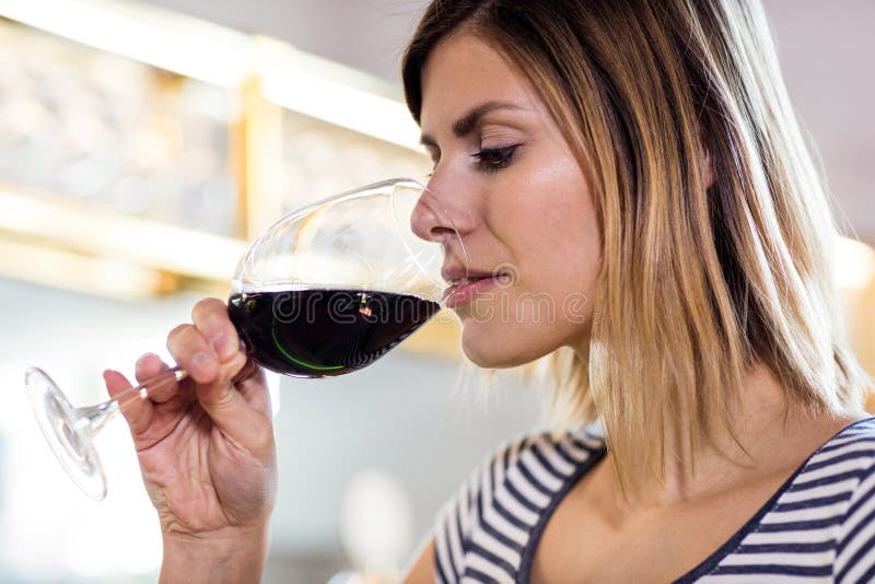 Young Woman Drinking Wine at Restaurant Stock Photo - Image of front ...
