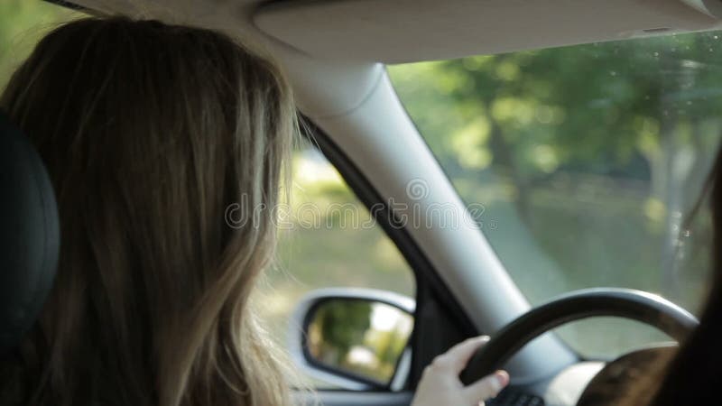 Young Woman Driving A Car, Rear View Stock Video - Video of girl ...