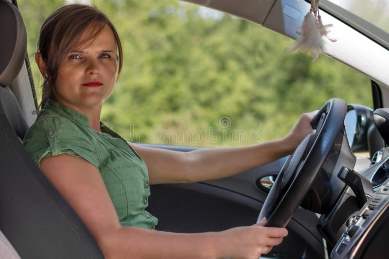 Young Woman Driving Her Car Stock Image - Image of people, person: 26594537