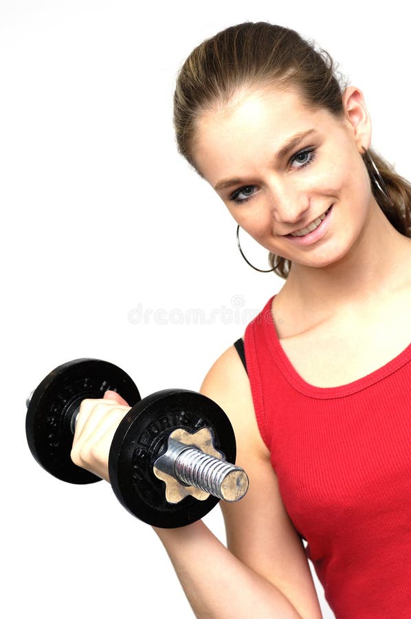 Young woman with dumbbell stock photo. Image of horsetail - 9994908