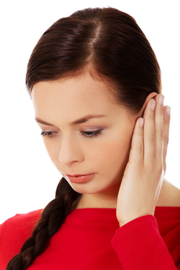 Young woman with ear ache stock photo. Image of face - 68727946