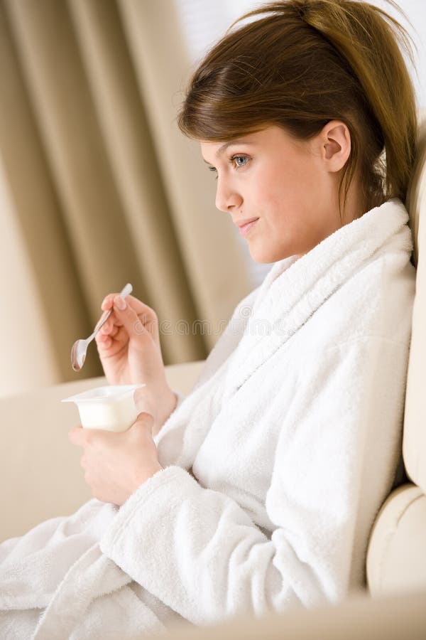 Woman Lying on Bed and Eating Ice-cream Stock Photo - Image of ...