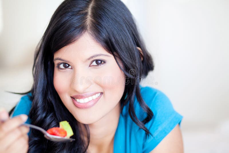 Young woman eating stock photo. Image of closeup, bedroom - 23393054
