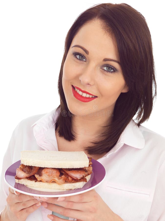 Young Woman Eating Holding Bacon Sandwich Stock Photos - Free & Royalty ...