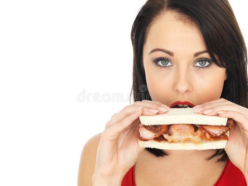 Young Woman Eating a Bacon Sandwich Stock Image - Image of isolated ...