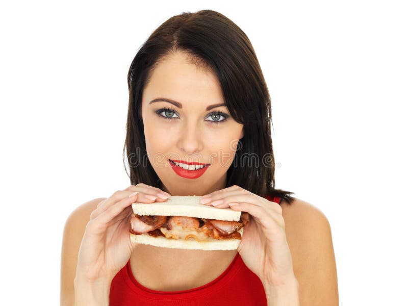 Young Woman Eating a Bacon Sandwich Stock Image - Image of female, path ...