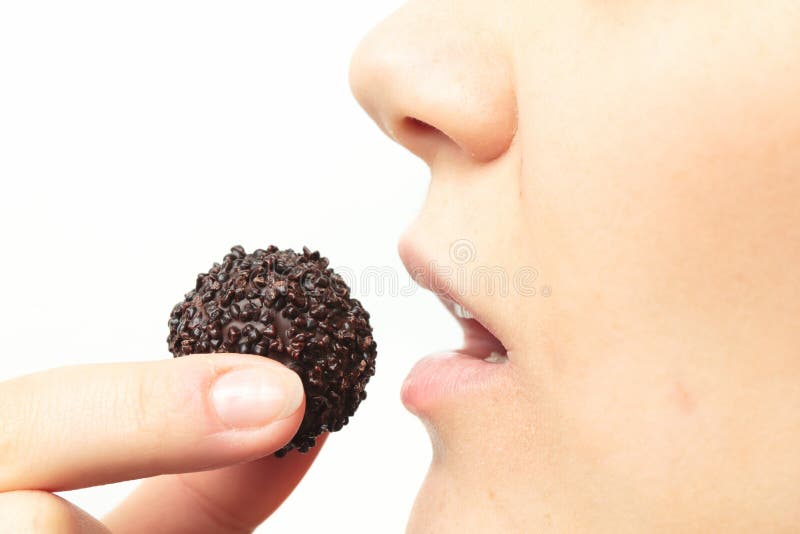 Young Woman Eating Chocolate Cookie Stock Photo - Image of creamy, dark ...