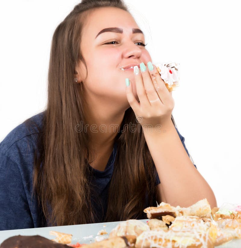 Glutton Woman Eating Cupcakes with Frenzy after Long Diet Stock Photo ...