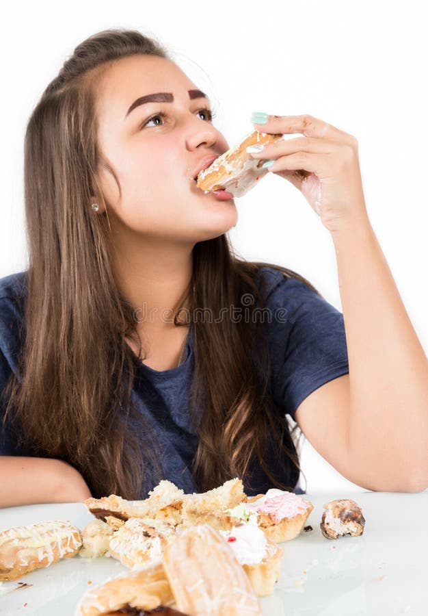Glutton Woman Eating Cupcakes with Frenzy after Long Diet Stock Photo ...