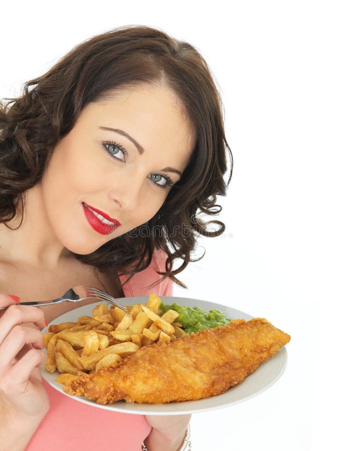 Young Woman Eating Fish and Chips with Mushy Peas Stock Image - Image ...