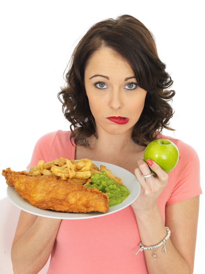 Young Woman Eating Fish and Chips with Mushy Peas Stock Photo - Image ...