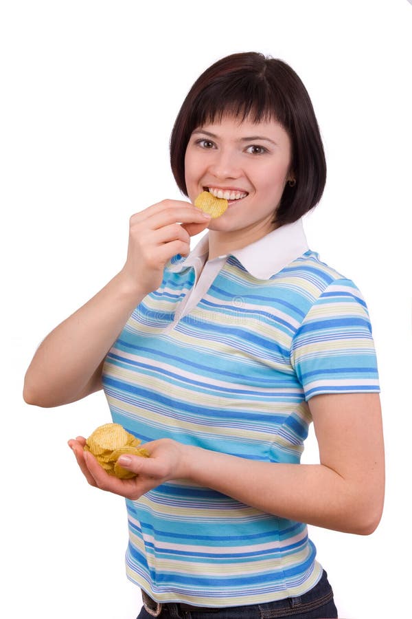 Young Woman Eating Potato Chips. Picture Image: 14749153 Young Woman Eating Potato Chips. Picture Image: 14749153