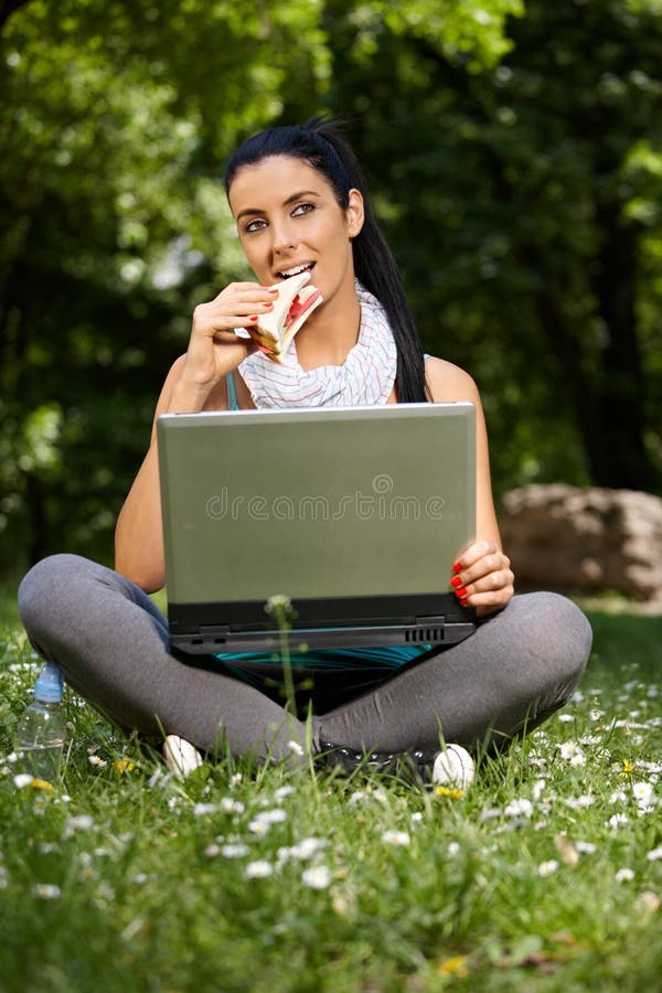 Young Woman Eating Sandwitch in Park Stock Photo - Image of good ...