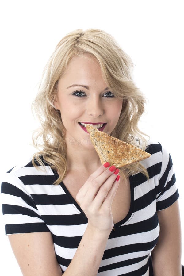 Young Woman Eating a Slice of Toast Stock Image - Image of white, slim ...
