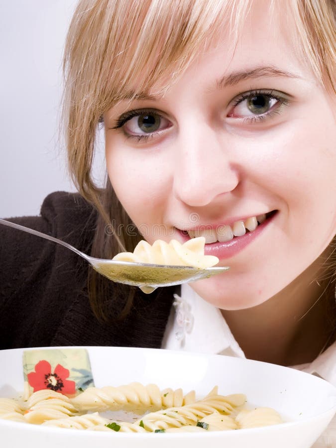 Young woman eating soup stock photo. Image of yummy, blond - 3317870