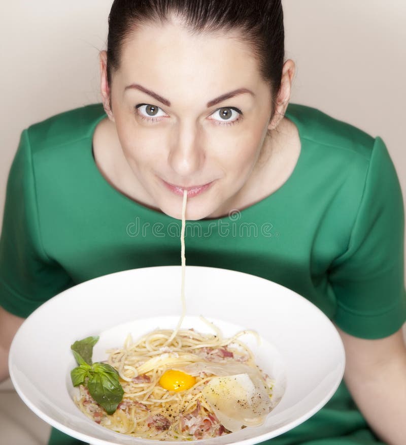Young Woman Eating Spaghetti Stock Image - Image of diet, indoor: 48576881