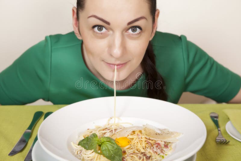 Young Woman Eating Spaghetti Stock Image - Image of domestic, lifestyle ...