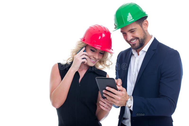 Young Woman Engineer Calling, Co-worker Showing Data on Tablet ...