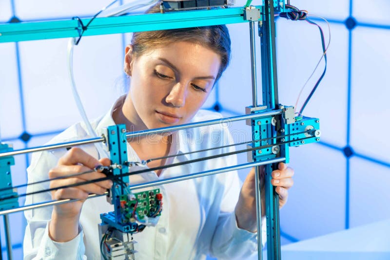 Young Woman Engineer in a Computer and Robotics Laboratory Stock Photo ...