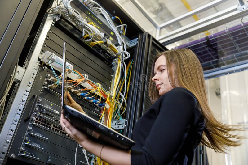 Young Woman Engineer at the Network Equipment Stock Image - Image of ...