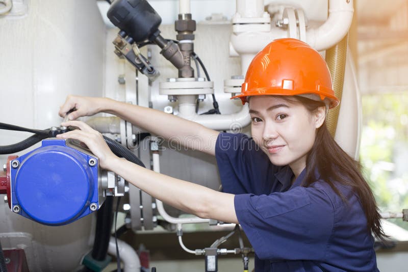 Young Woman Engineer Setup and Testing Machine Stock Image - Image of ...