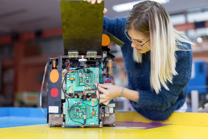 Young Woman Engineer Working on Robotics Project Stock Image - Image of ...
