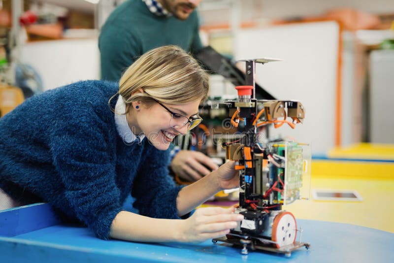 Young Woman Engineer Working on Robotics Project Stock Image - Image of ...