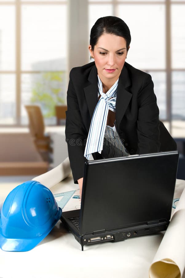 Young Woman Engineer Works on Laptop Stock Image - Image of ...