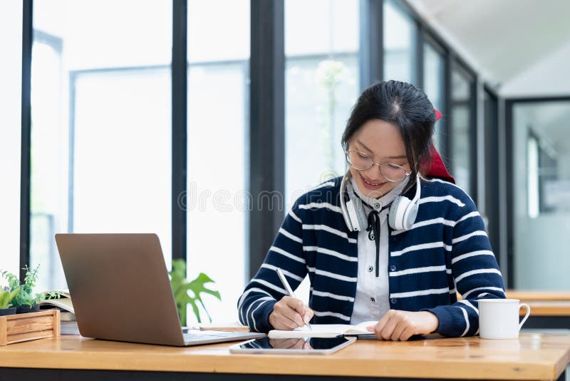 Young Woman Enjoying Self-directed Learning with Online Educational ...