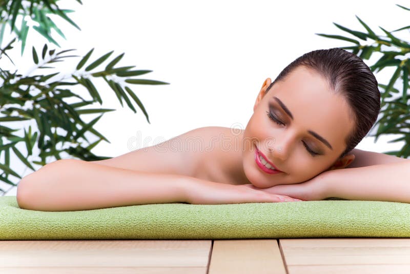 The Young Woman Enjoying Spa Treatment Stock Photo - Image of petal ...