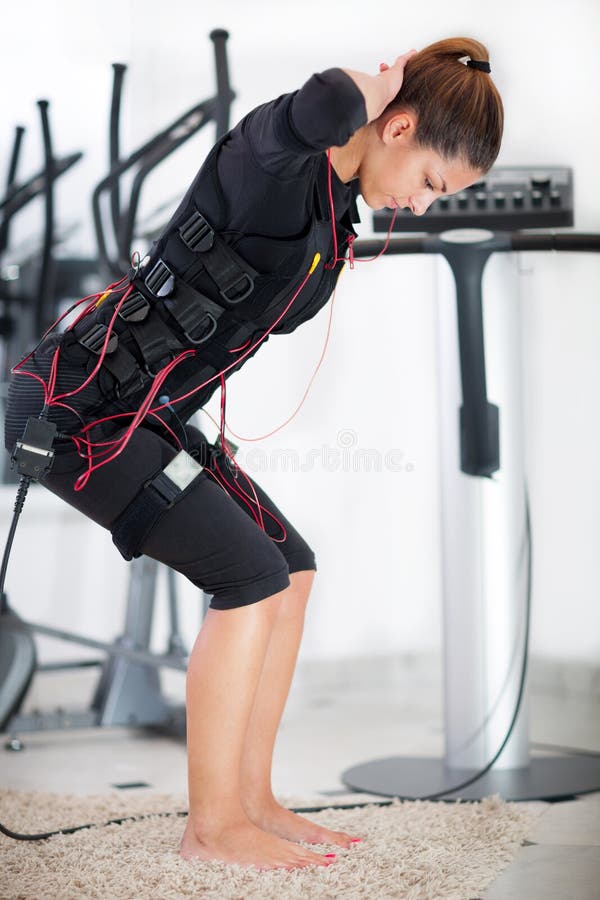 Young Woman Exercise on Electro Stimulation Machine Stock Image - Image ...