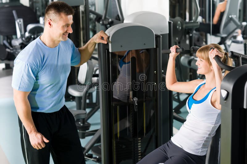 Young Woman Exercise on Shoulder Press Machine Stock Image - Image of ...
