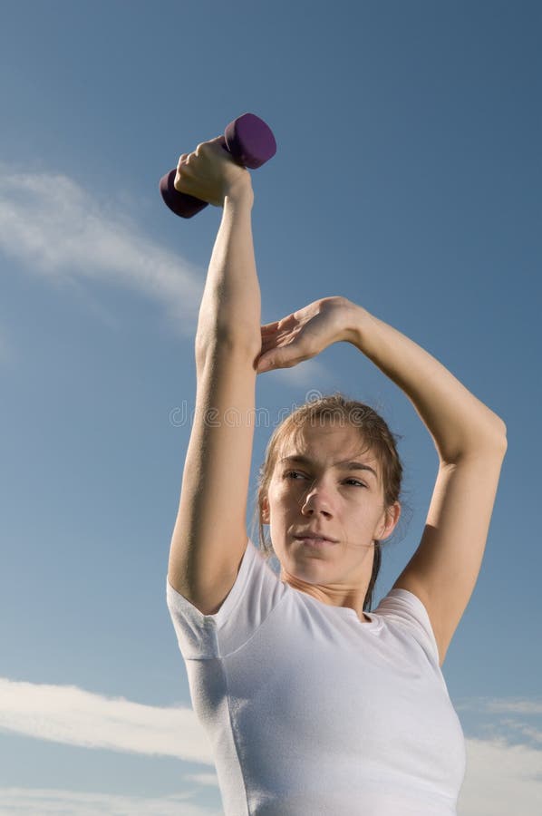 Young Woman Exercising Outdoors Stock Photo - Image of female, activity ...