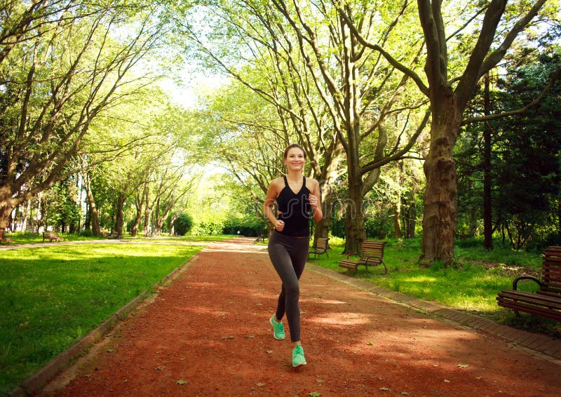 Young Woman Exercising Running in Summer Park Stock Photo - Image of ...