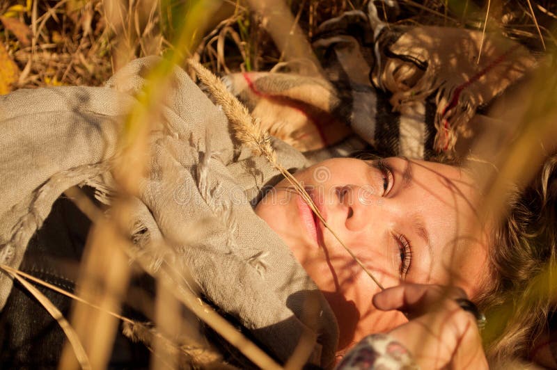 Young Woman is on the Fall Grass Stock Photo - Image of peasant ...