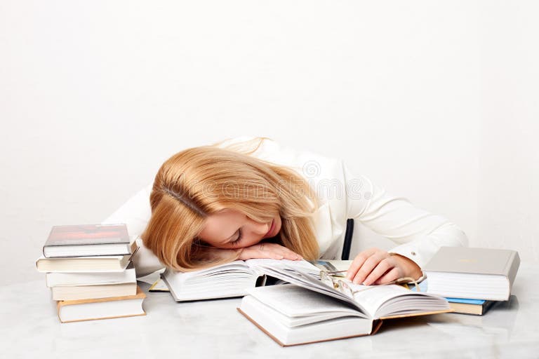 Young Woman Falling Asleep while Studying Stock Photo - Image of ...
