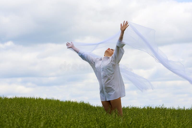 Young woman in a field. stock photo. Image of green, elegant - 11110348