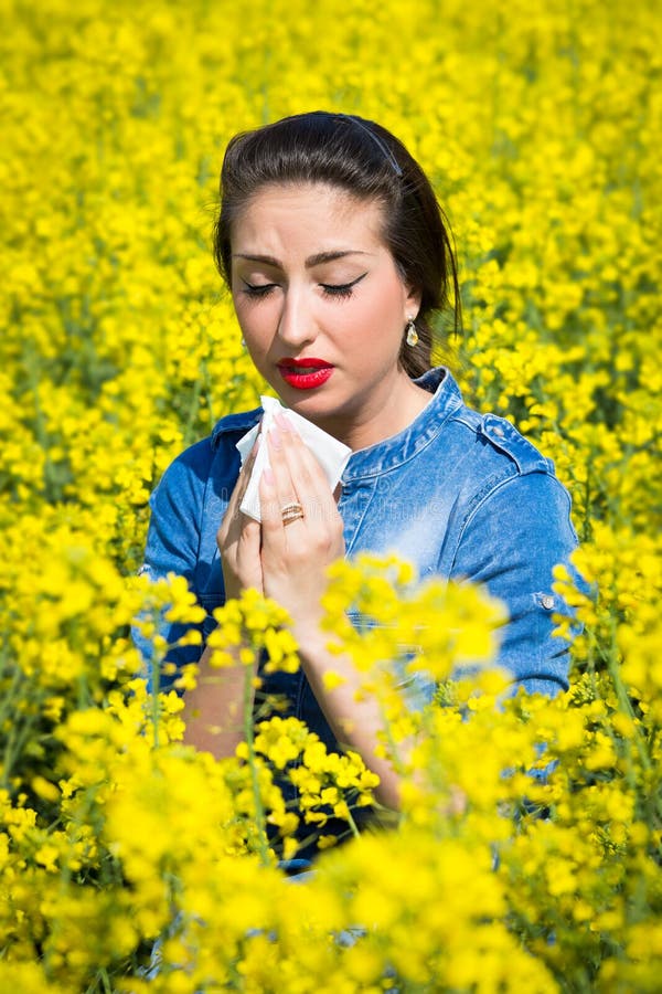 Young Woman in a Field Has Hay Fever Stock Image - Image of young ...
