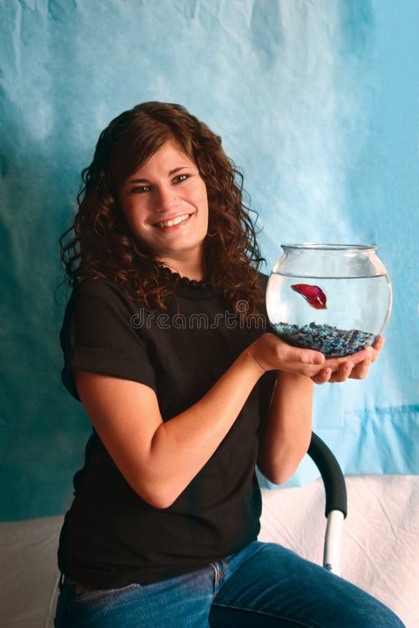 Young woman with fish stock image. Image of fish, animal - 5683285