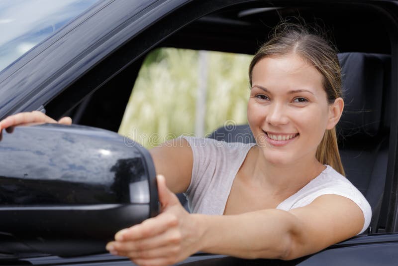 Young Woman Fitting Car Side Mirror Stock Image - Image of seat, owner ...