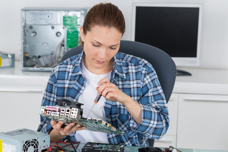Young Woman Fixing Computer Motherboard Stock Image - Image of device ...