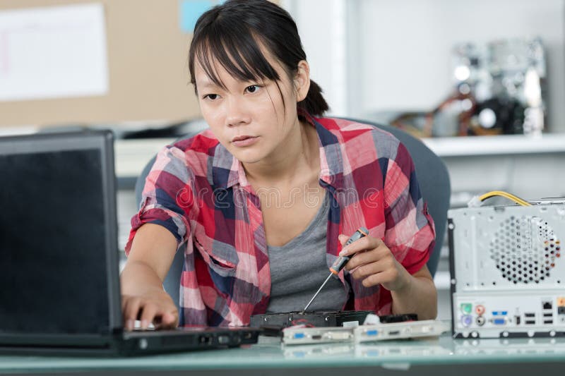 Woman Fixing Desktop Computer Seated Table Stock Photos - Free ...