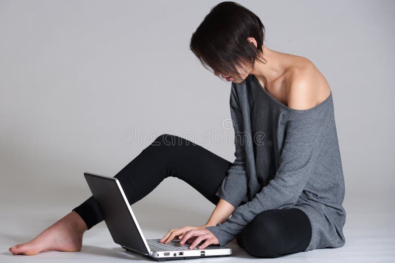 Young Woman on Floor with Notebook Stock Image - Image of brown, color ...