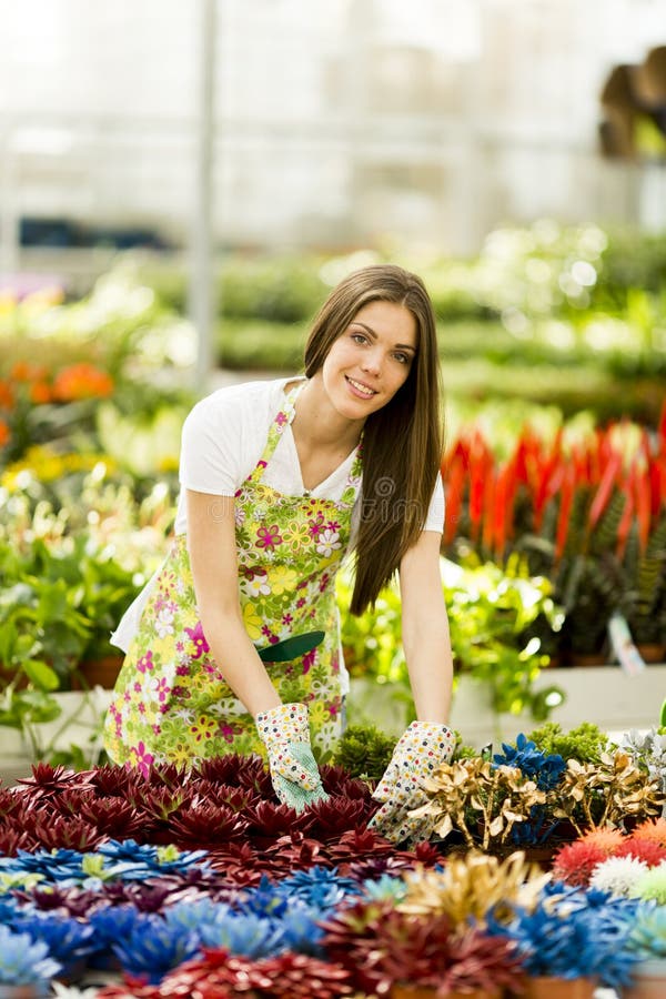 Young Woman in Flower Garden Stock Photo - Image of leisure, hold: 38952698