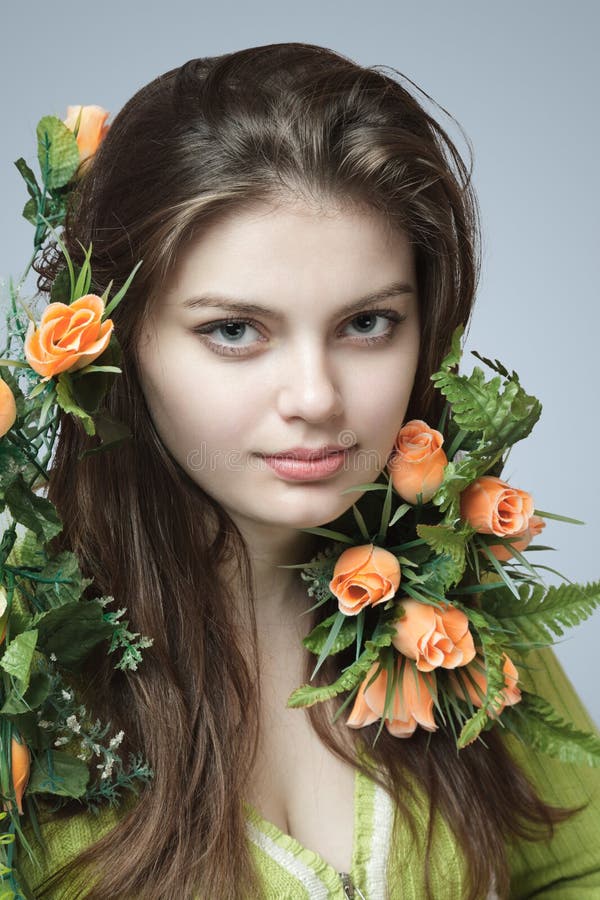 Young woman with flowers stock photo. Image of roses - 20372920